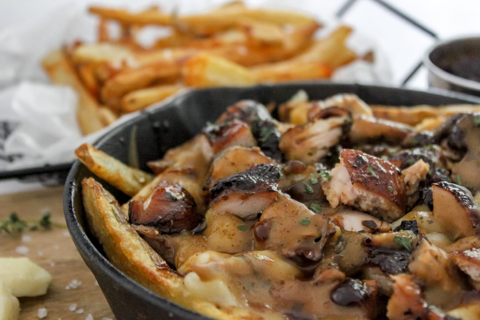 Jerk Chicken Poutine - The Seasoned Skillet